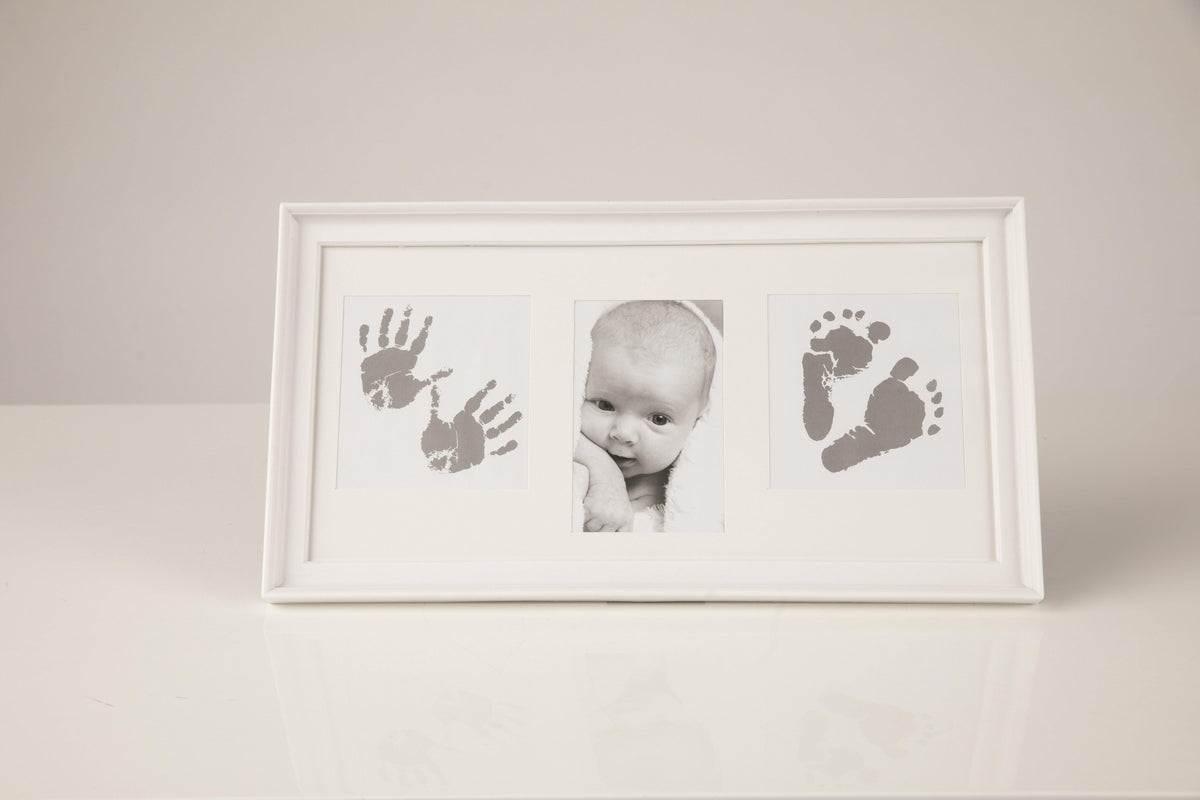 Photo frame press for imprint of baby hands and feet